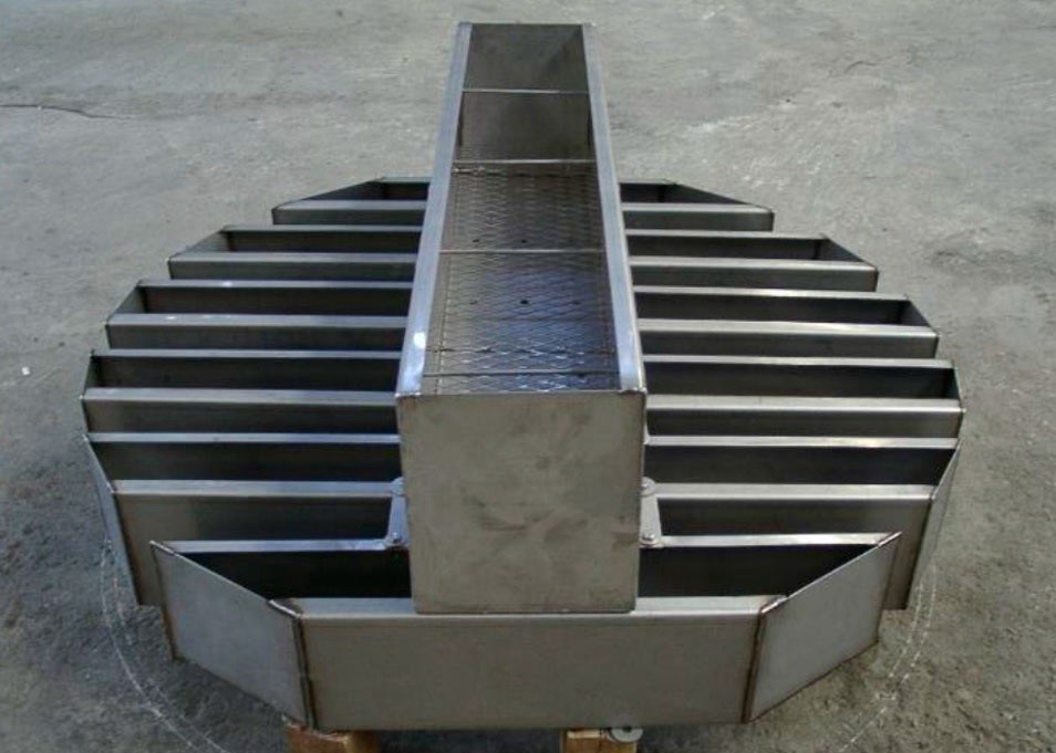 Trough - type liquid distributor tower internal design and manufacturing